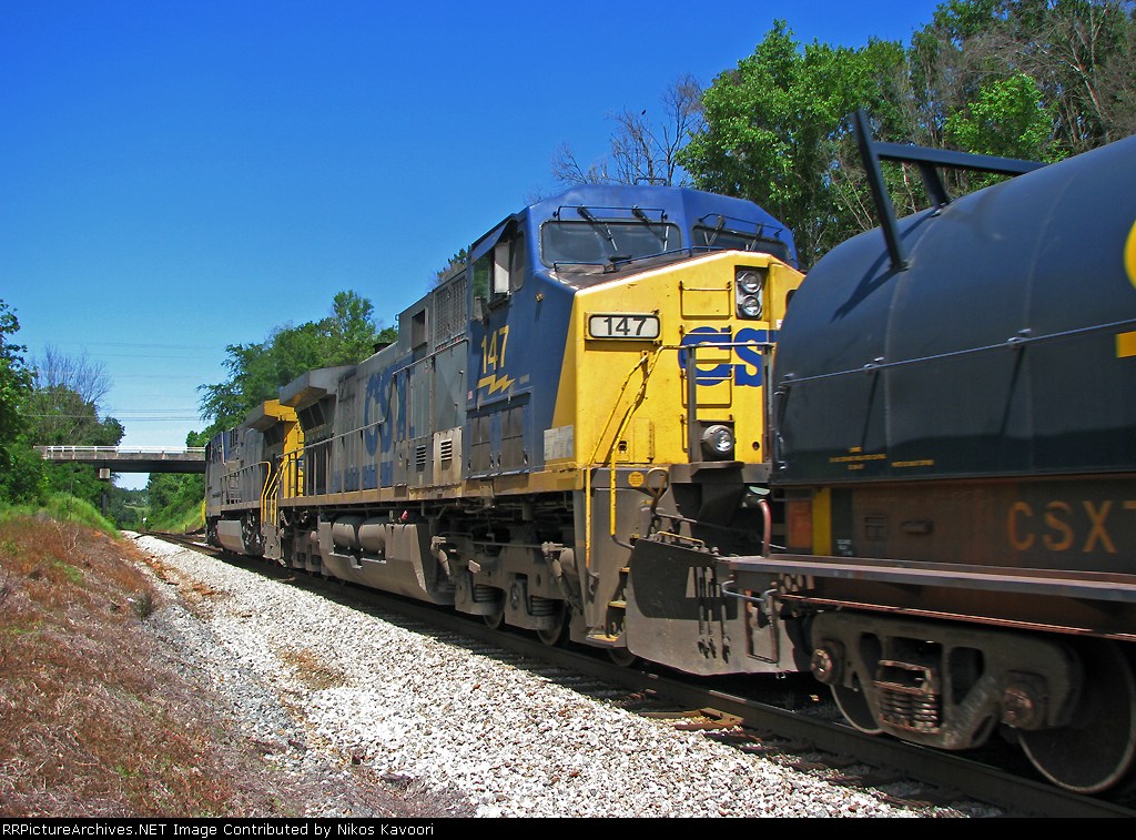 CSX 147 trails on Q619
